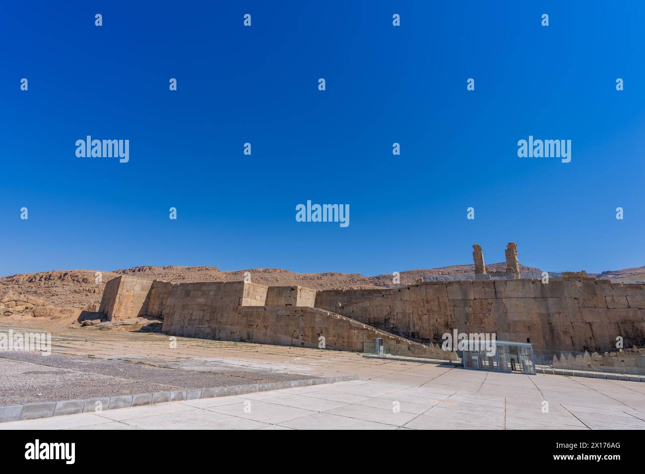 A breathtaking view of the stone ruins, standing tall against a clear ...