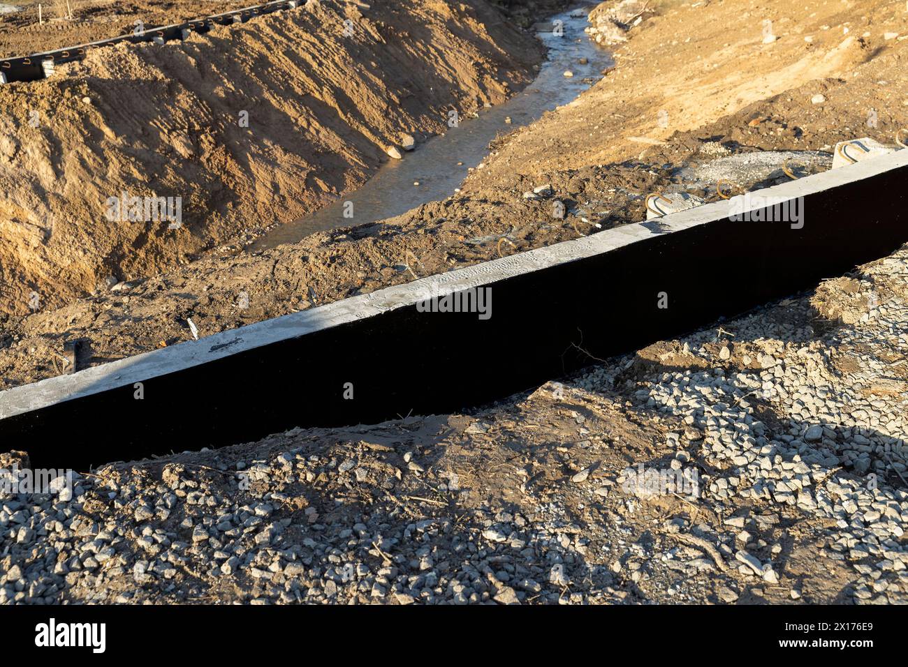 processing of concrete slabs on the riverbank during the construction ...