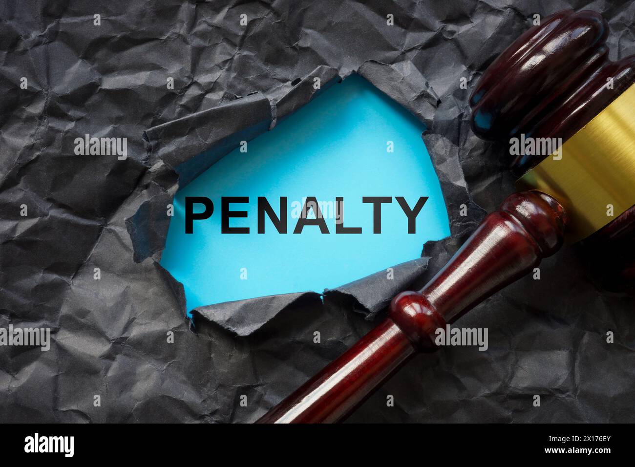 Penalty concept. Torn paper and a gavel as a symbol of justice Stock ...