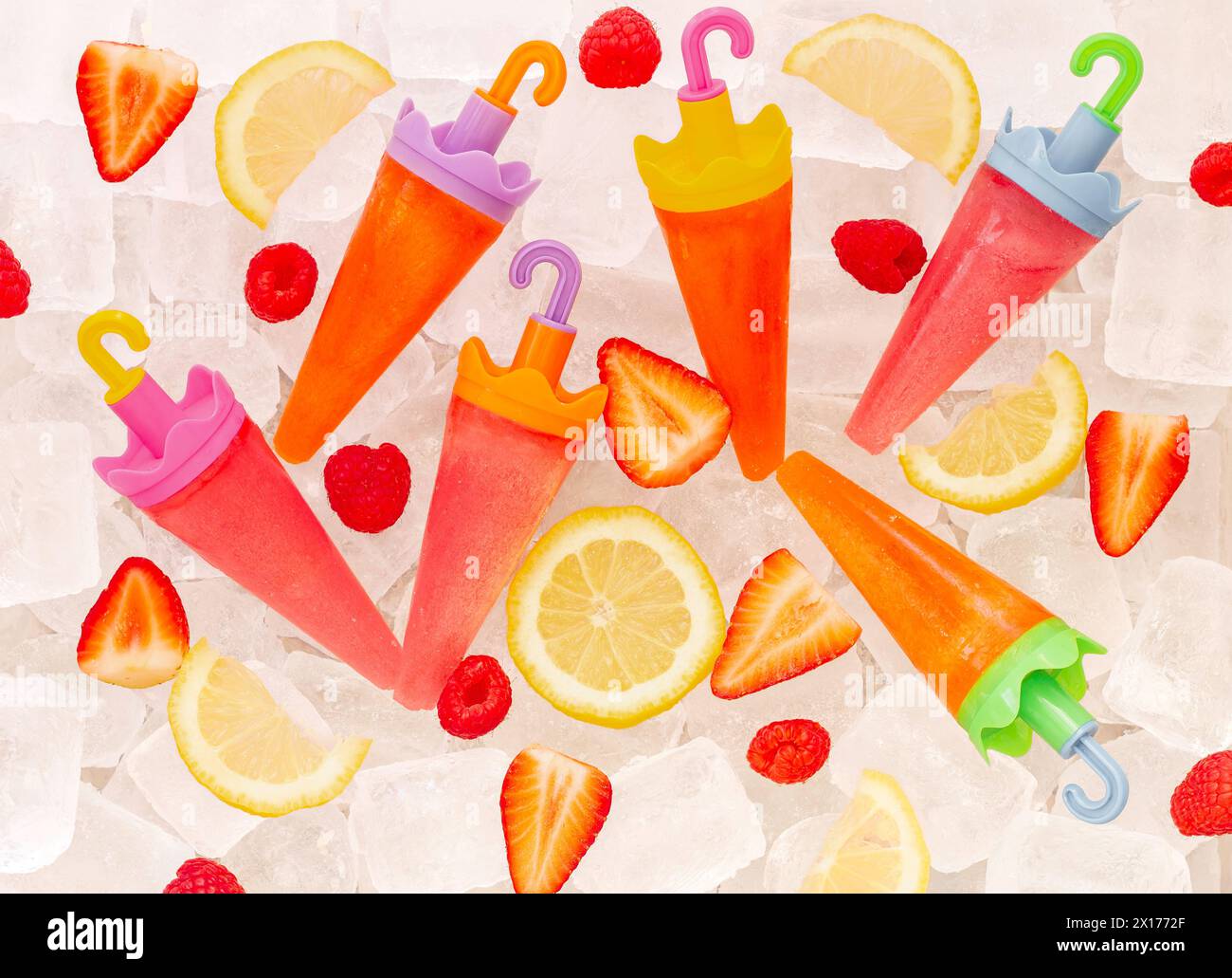 Umbrella Shaped Fruity Ice Lollies on Ice Background Stock Photo - Alamy