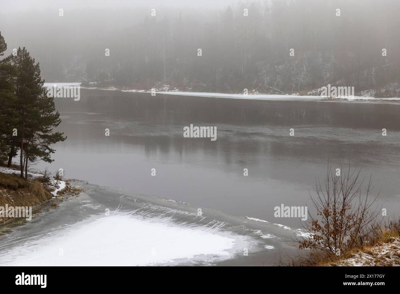 river in winter, river bank and water in winter in foggy weather Stock ...