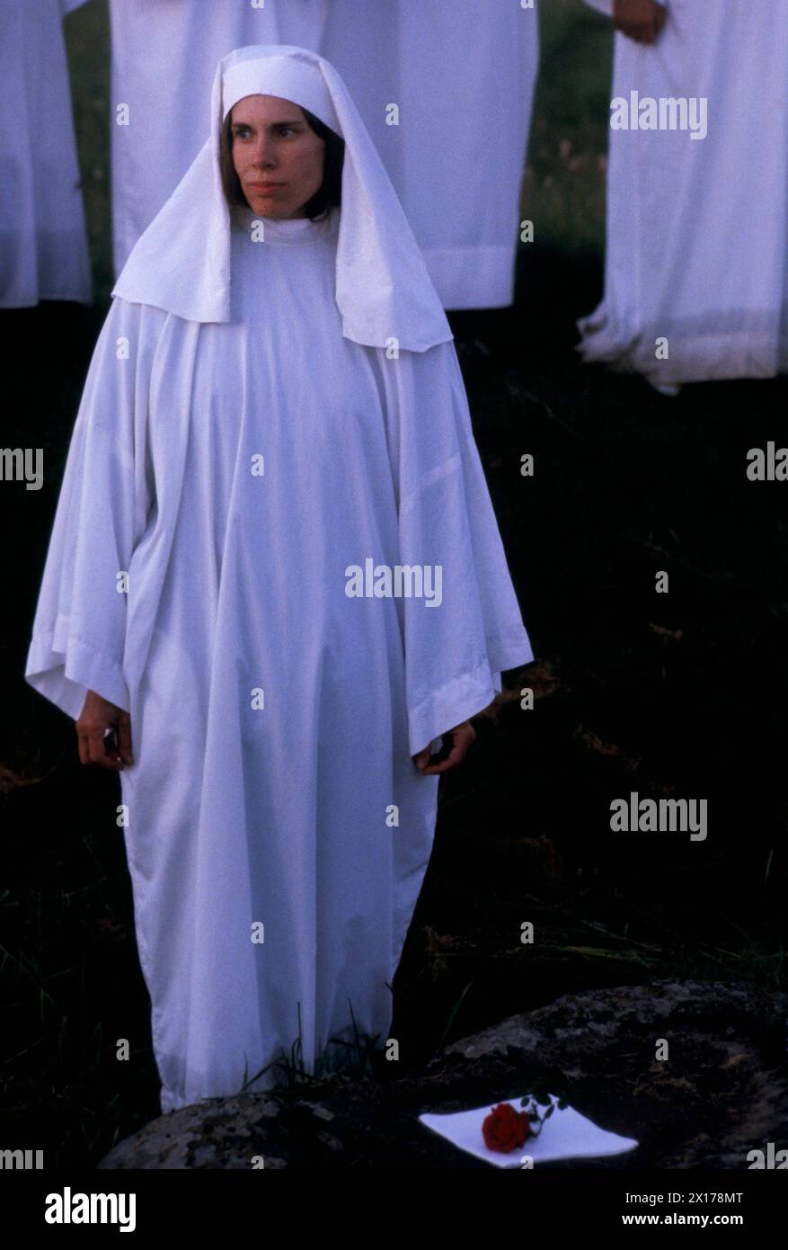 Summer solstice June 21st 1970s UK. Druids gather at Stonehenge an ...