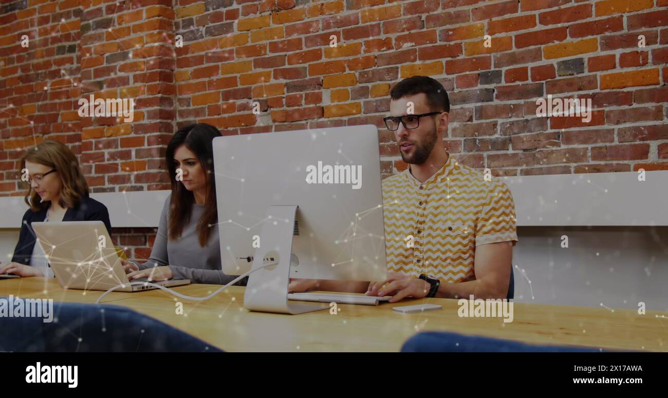 Image of icons over three caucasian people using computer Stock Photo ...