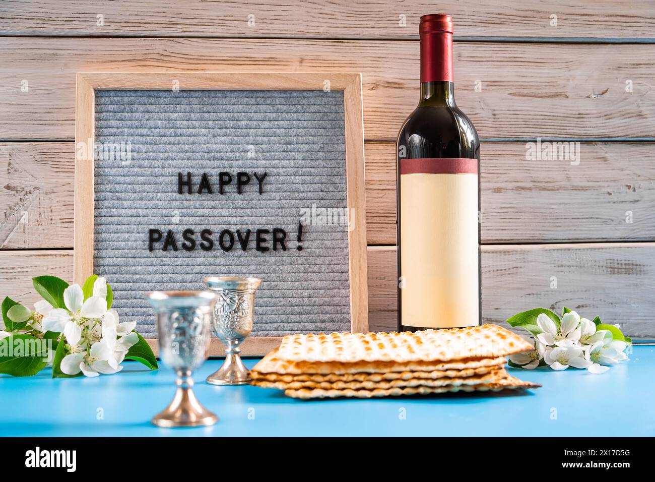Celebrating spring holiday Passover. Bottle of wine and traditional ...
