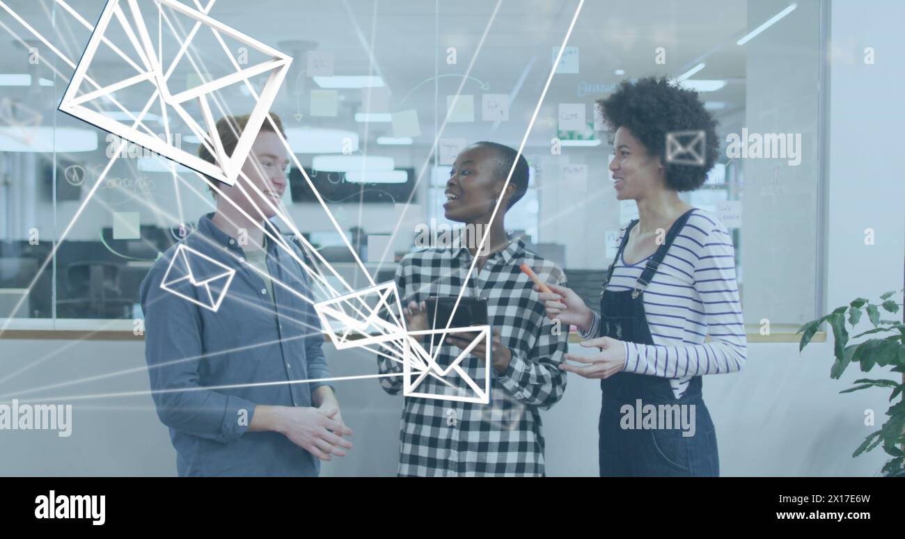 Image of network of message icons over group of diverse colleagues ...