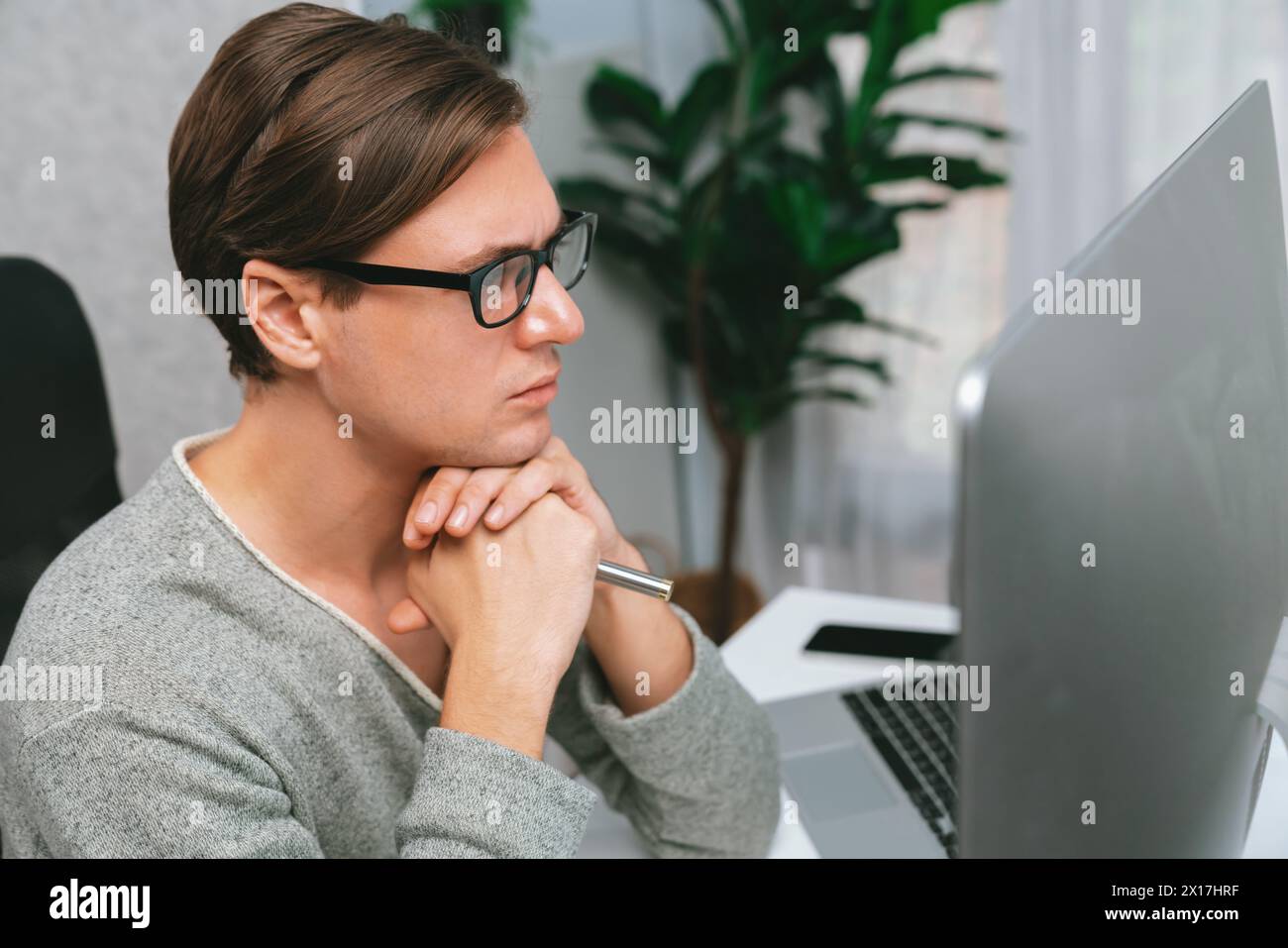 Smart office worker looking camera with serious face of focusing facial ...