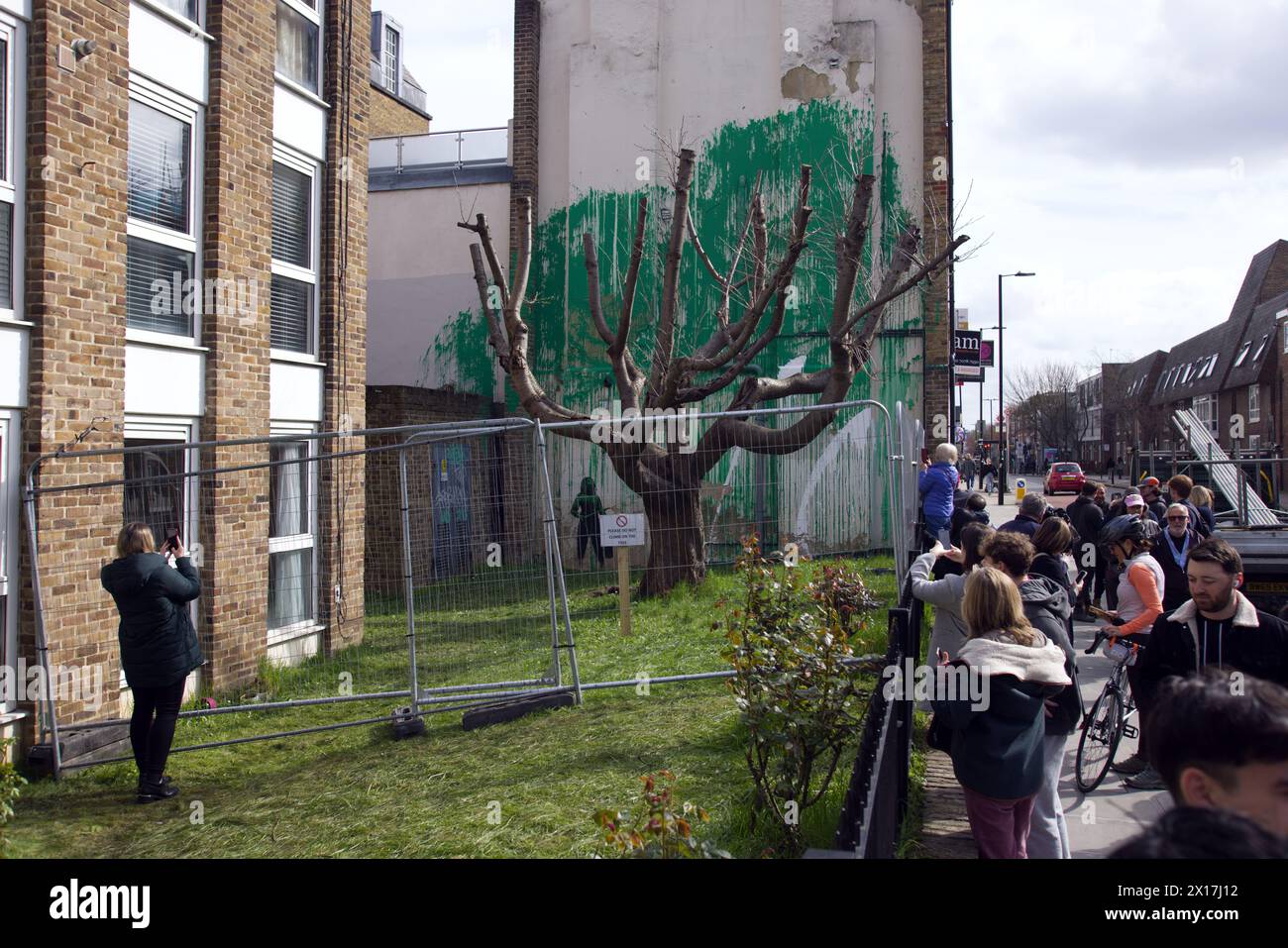 Banksy tree mural hi-res stock photography and images - Alamy