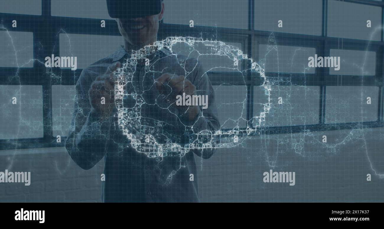 Image of human brain spinning and data processing over businessman ...