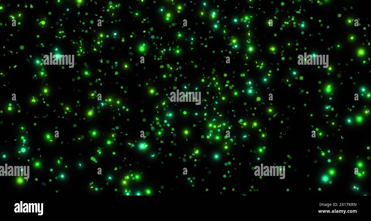 Image of glowing spots of green light on black background Stock Photo ...