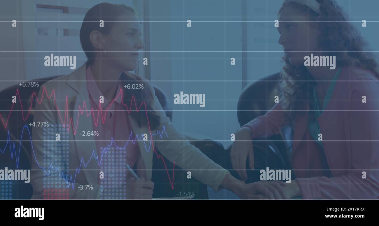 Image Of Statistical Data Processing Over Two Diverse Female Colleagues