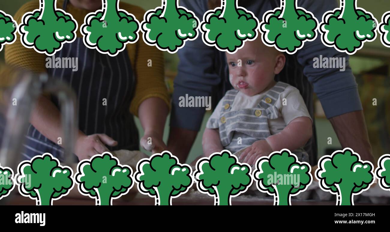 Image of broccoli icons over caucasian family cooking Stock Photo - Alamy
