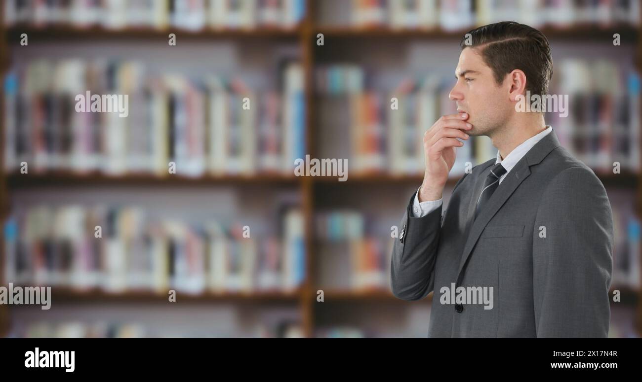 Side view of a businessman using a digital screen in a library 4k Stock ...