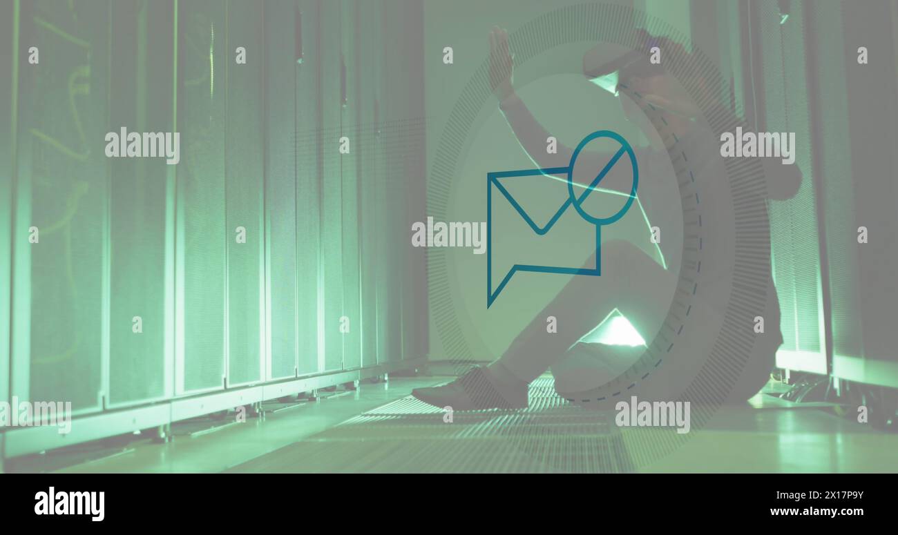 Image of message block icon over asian male engineer wearing vr headset ...