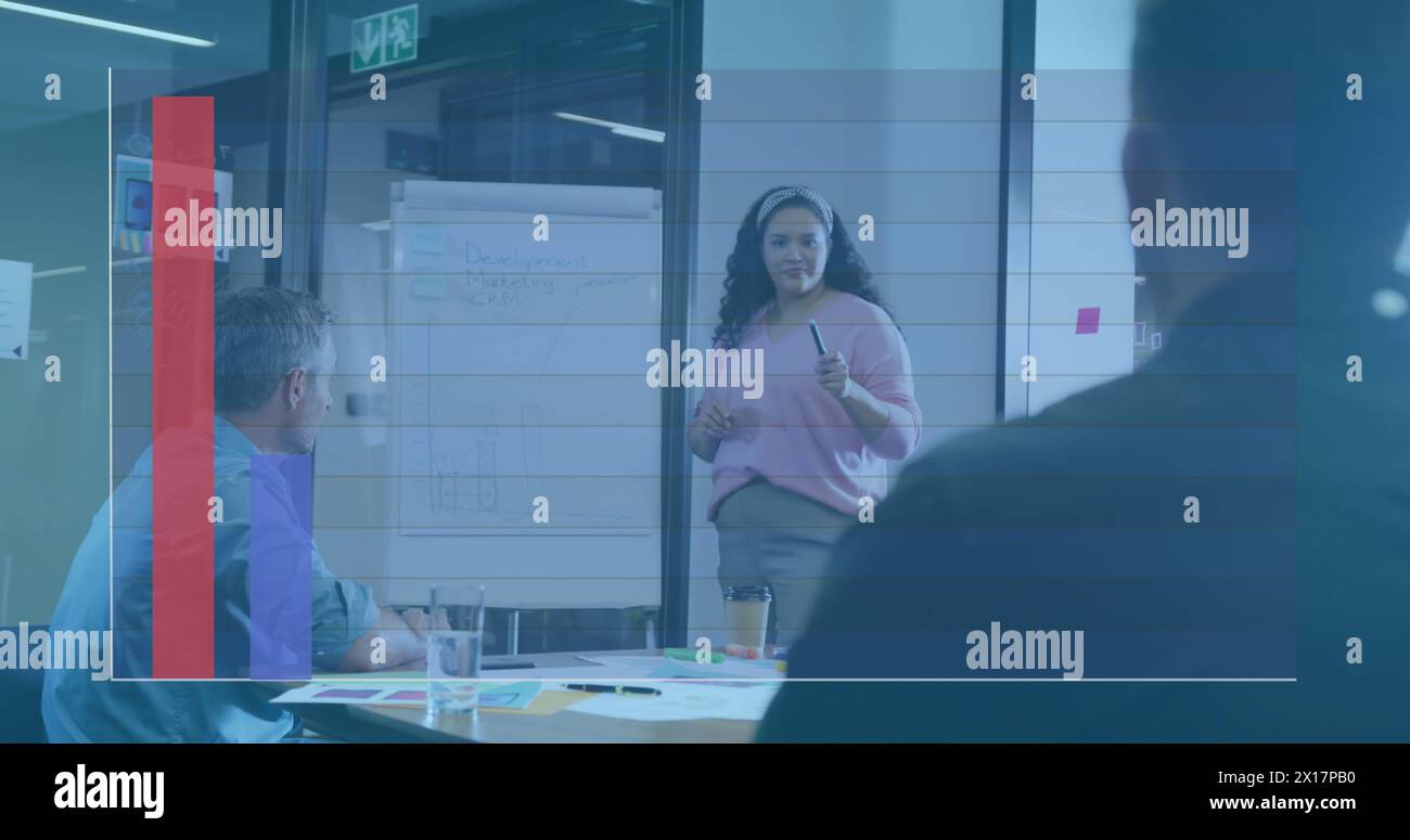 Image of colourful bar graph moving over caucasian businesswoman giving ...