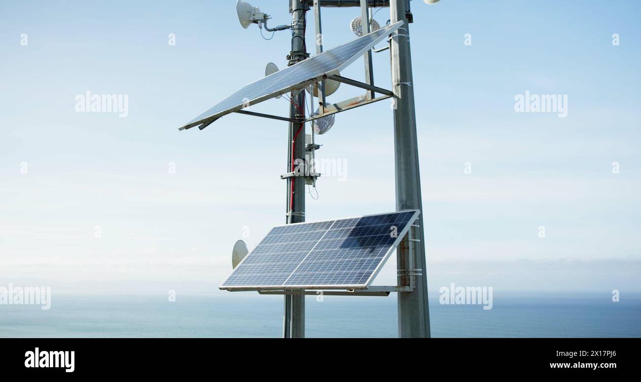 Solar panel, energy and roof with ocean, sky and horizon with ...