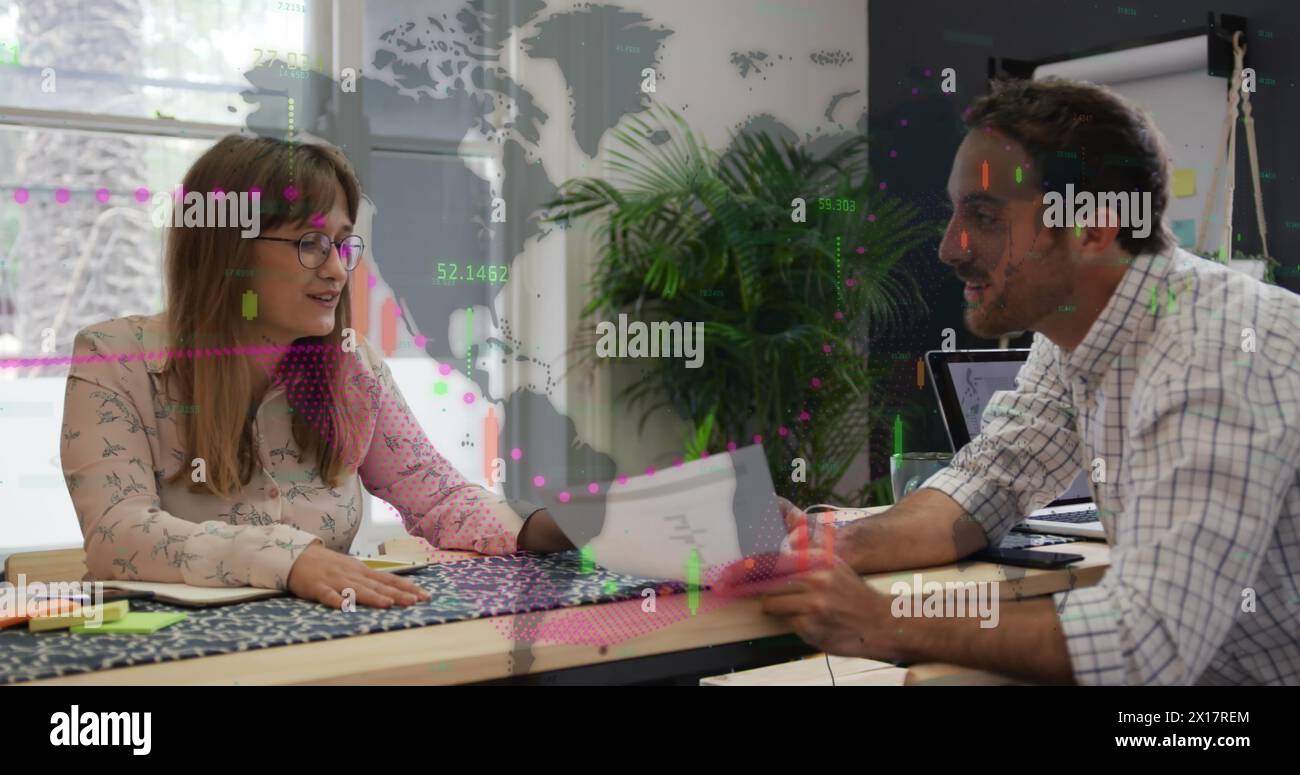 Image of graphs with numbers and map over diverse coworkers sharing ...