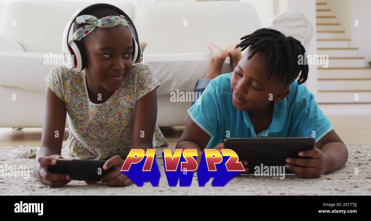 Image of p1 vs p2 text with african american children using tablet and ...