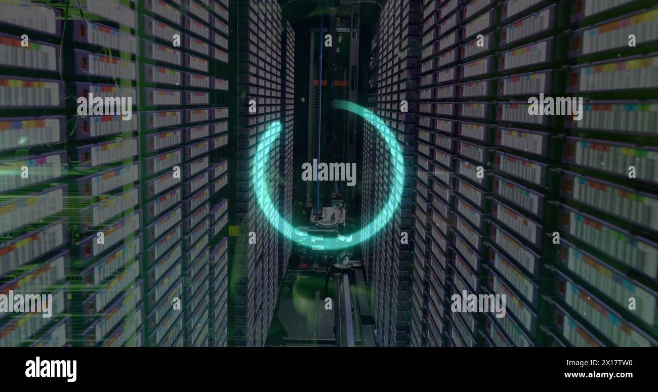Image of loading circle over dots against server racks and equipment in background. Digital ...