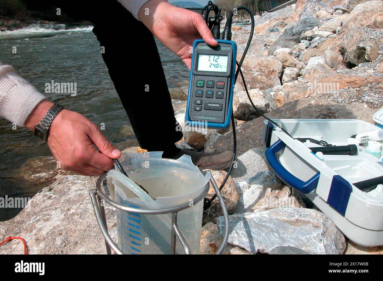 taking a sample to measure and analyze the water quality taking sample ...