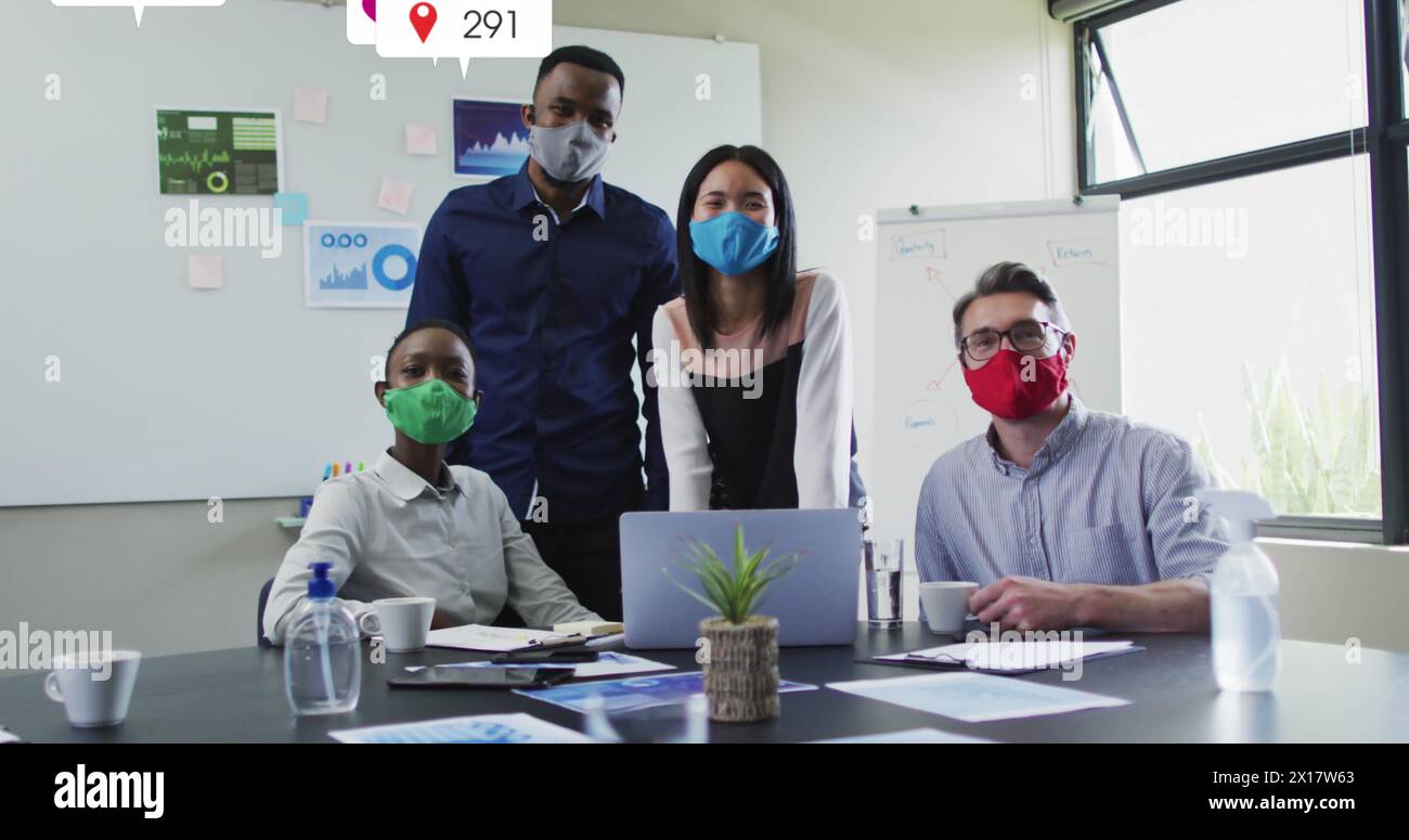 Image of social media icons over portrait of diverse colleagues wearing ...