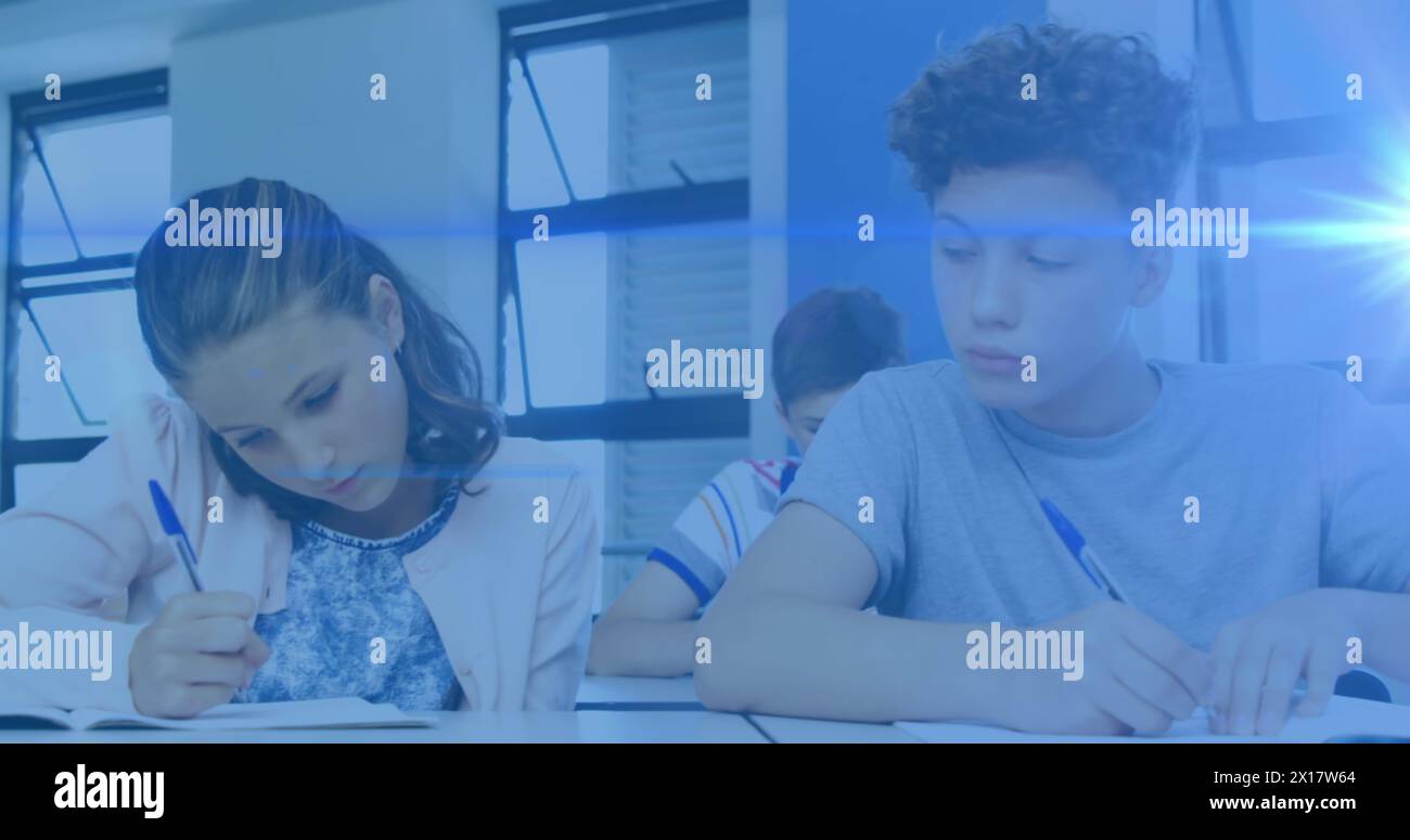 Image of caucasian male and female students writing test at school ...