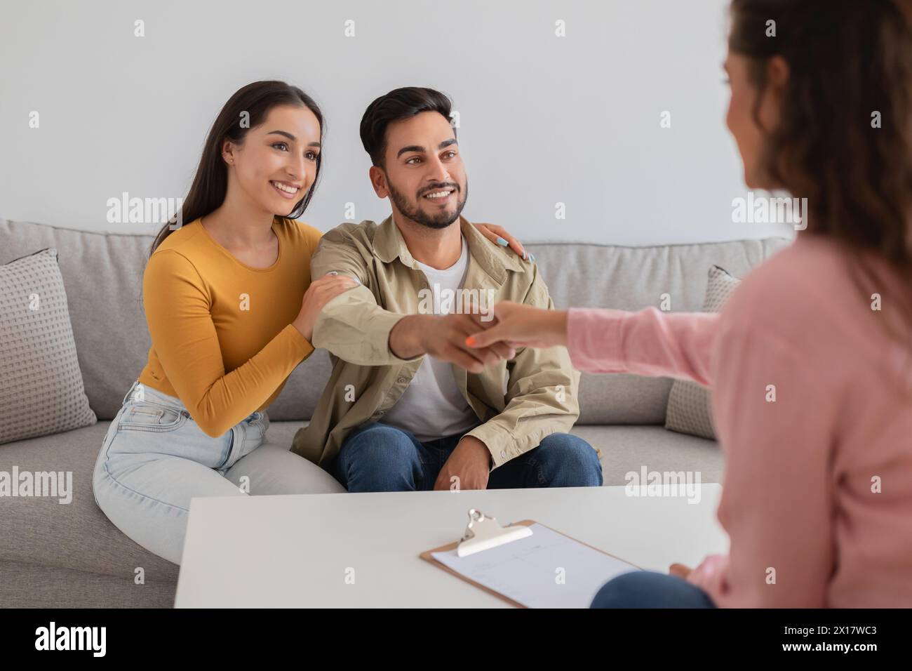 Couple and therapist engage in positive interaction Stock Photo - Alamy