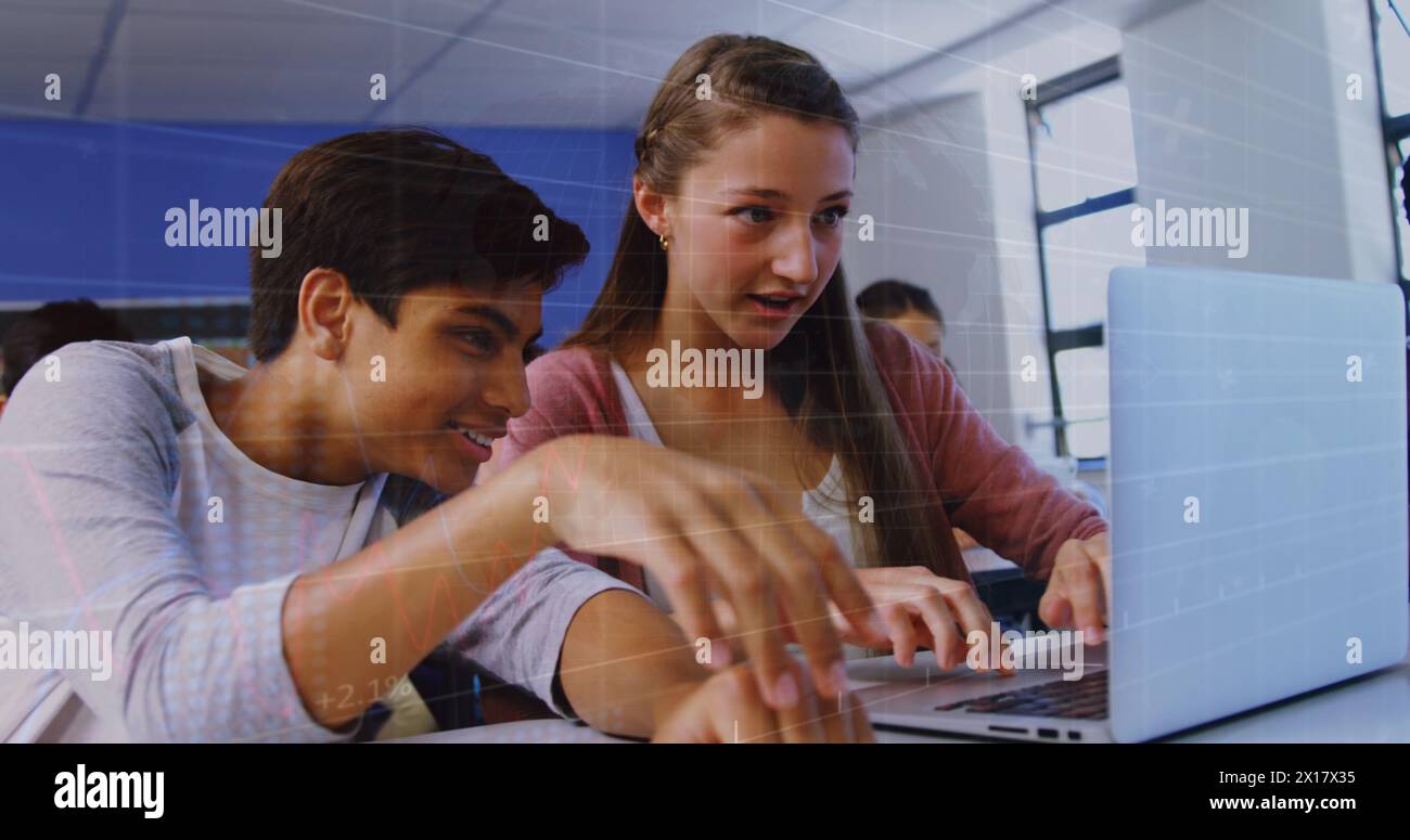 Image of multiracial students studying using laptop in classroom over ...