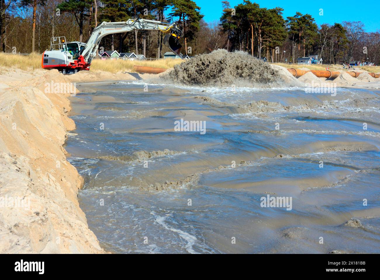 Renaturation, Repair of erosion-damaged beach. Sand is sucked up from ...