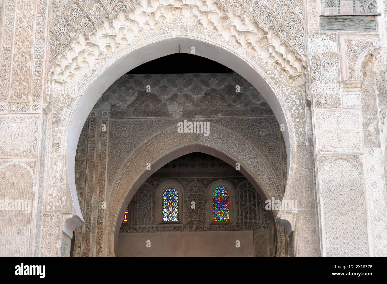 Fez, Prayer niche with fine stone carvings and stained glass windows ...