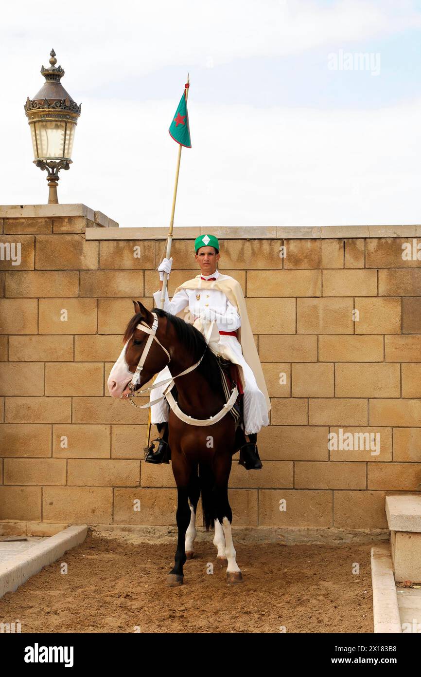 Horseman, Guard in traditional uniform in front of the gate Mausoleum ...