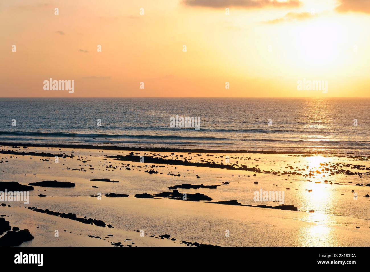 Asilah, Peaceful scenery of a sunset by the sea with golden light, Rabat, Morocco, North Africa ...