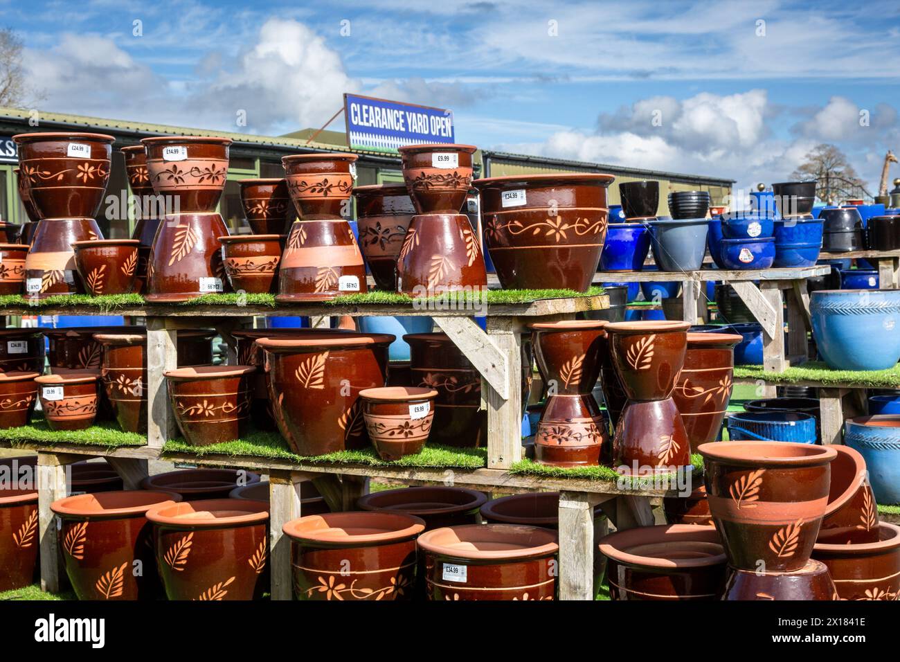 Glazed clay garden pots on display in a garden centre, UK Stock Photo ...