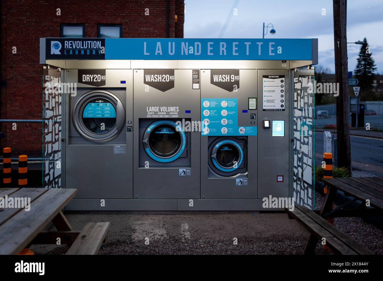 Open air launderette on a UK pub car park, 2024 Stock Photo - Alamy
