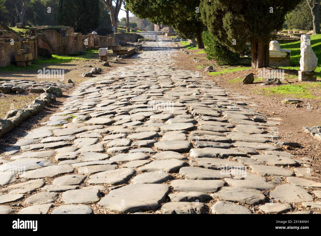 Ancient roman road in Ostia Antica. Rome, Latium, Italy Stock Photo - Alamy