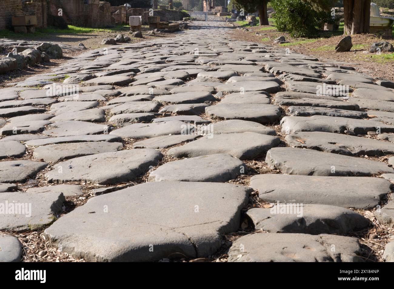 Ancient roman road in Ostia Antica. Rome, Latium, Italy Stock Photo - Alamy