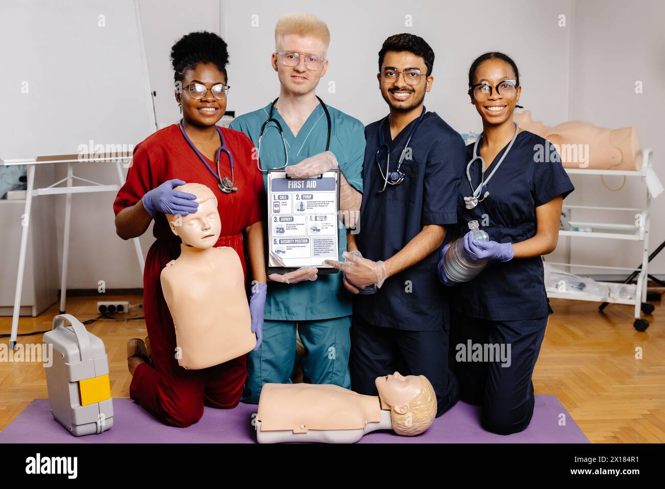 A group of doctors in professional attire standing closely next to each ...