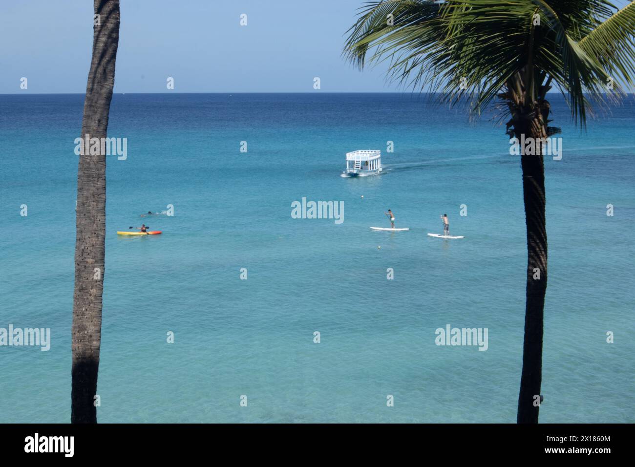 Barbados coast tranquil sea and water activities Stock Photo - Alamy