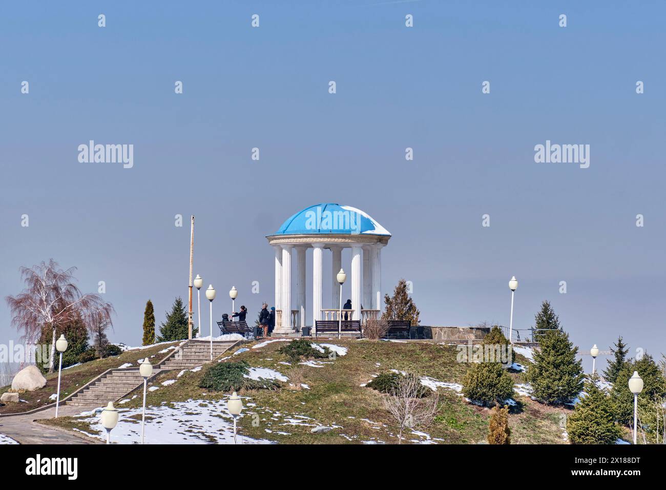 Close-up of observation deck with rotunda on top of hill. Park of first president Almaty ...
