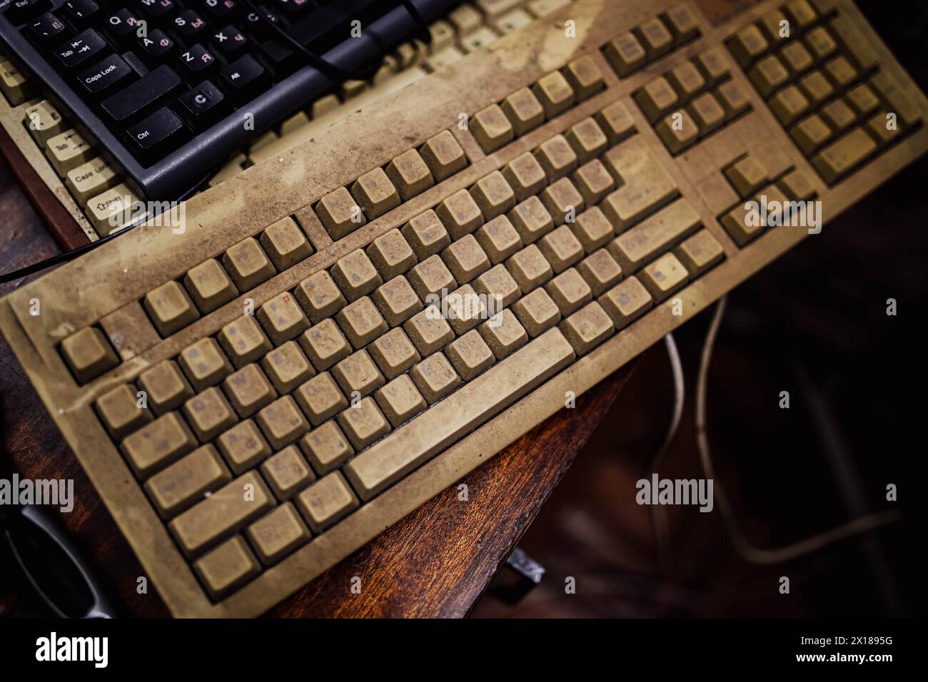 Old vintage computer mechanical keyboard in dust, computer keyboard ...