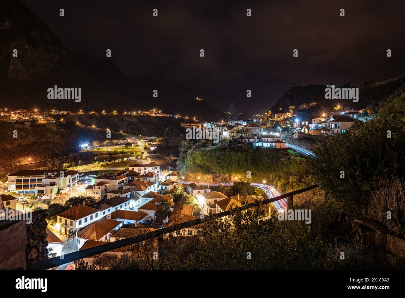 Description: Late night-time atmosphere, street lighting and car light ...