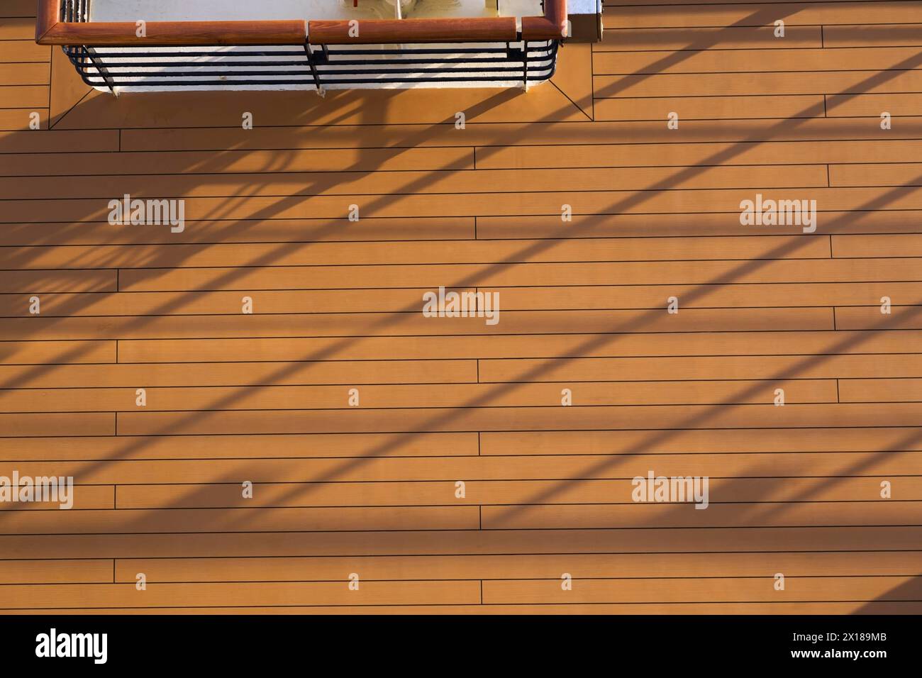 Top view of nonslip wood plank deck with shadow lines on a ship, Souda ...
