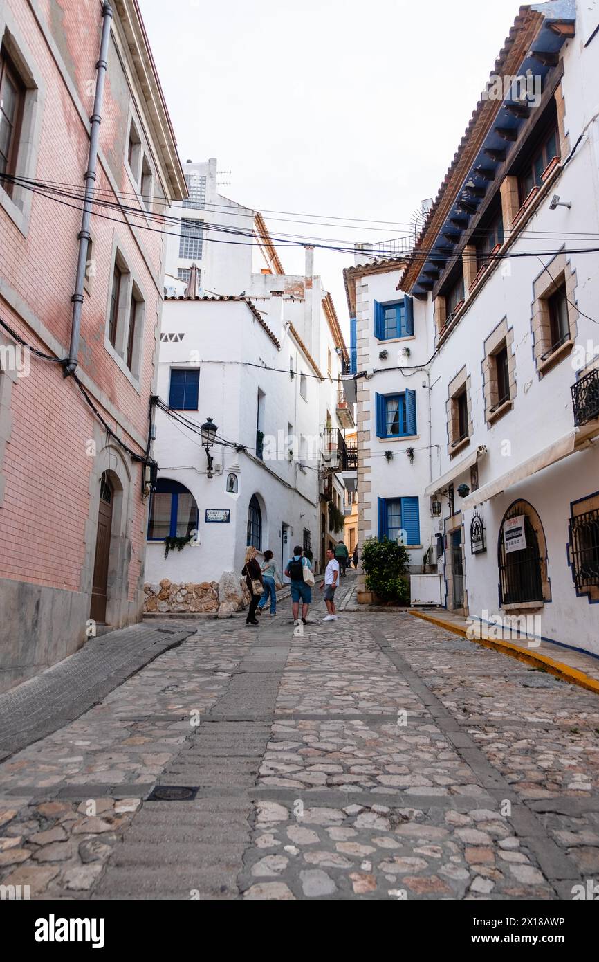 Alley in the old town centre of Sitges, Spain Stock Photo - Alamy
