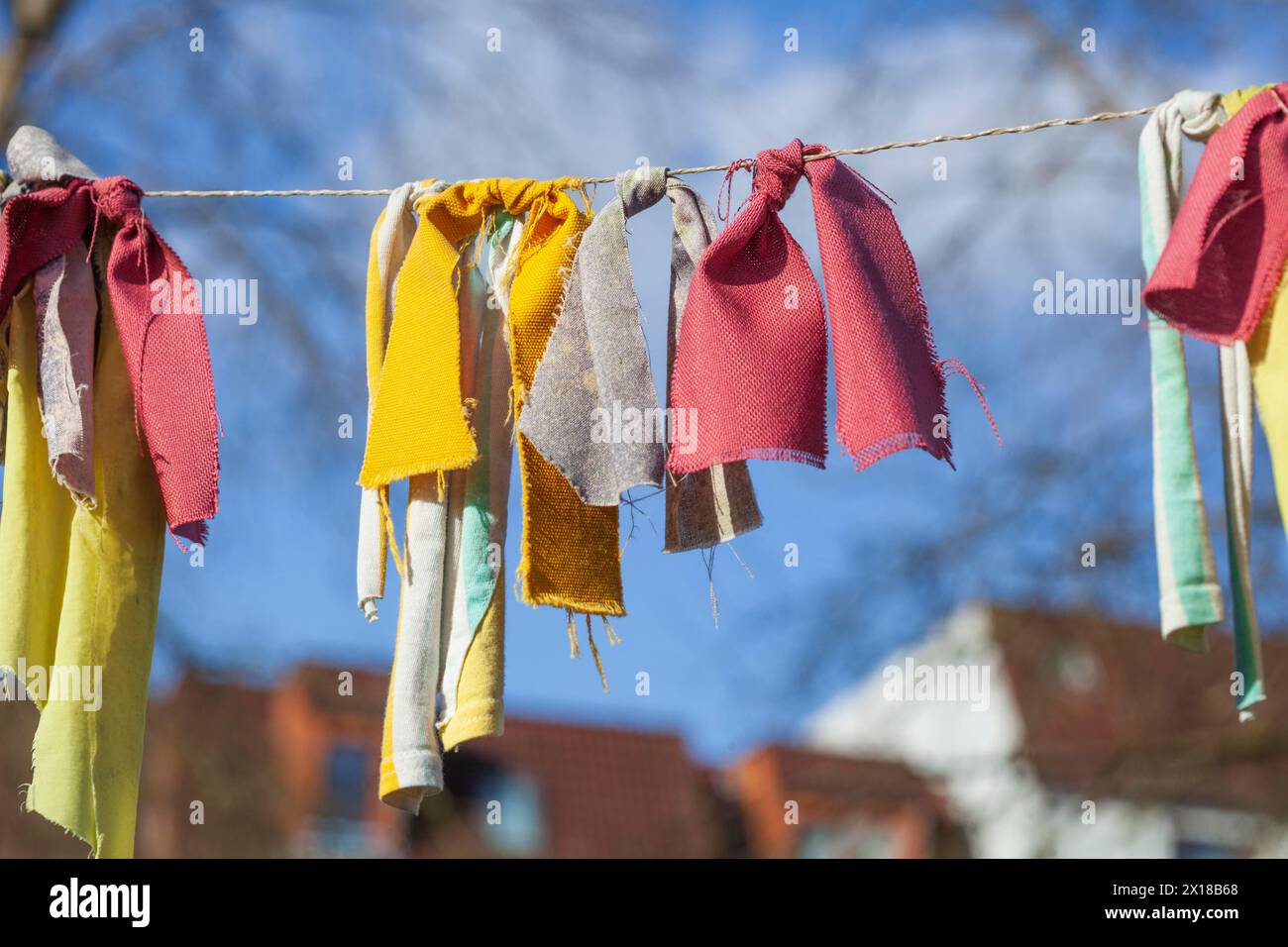 Colourful rags hanging on a washing line, Germany Stock Photo - Alamy