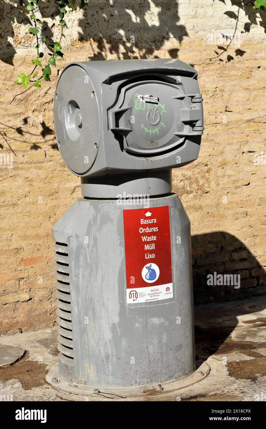 Seville, Public waste sorting bin with a reuse symbol and stickers ...