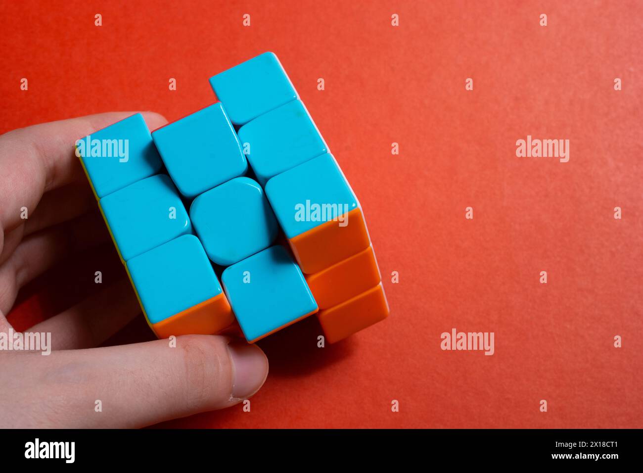 Rubik's cube in female hands. problem solving Stock Photo - Alamy