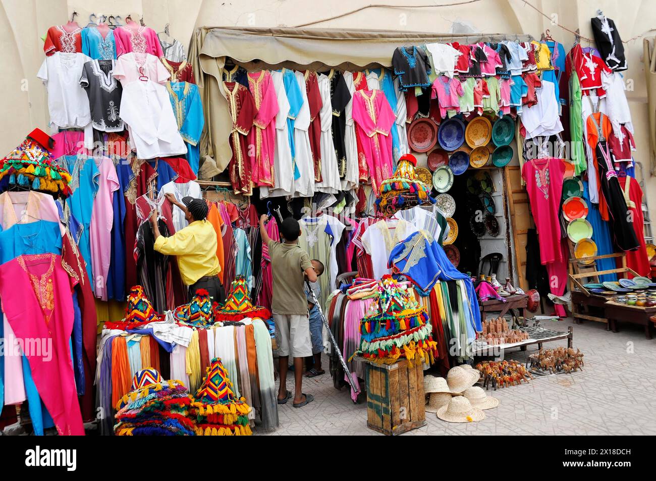 Clothing, souvenirs, mementos in a souvenir shop on Place Djemma el-Fna ...
