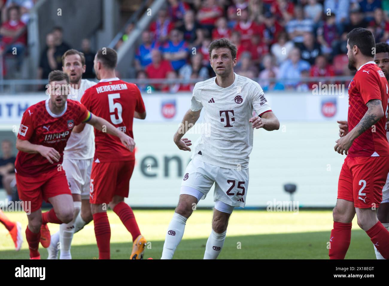 Football match, the players in the penalty area concentrate on the ...