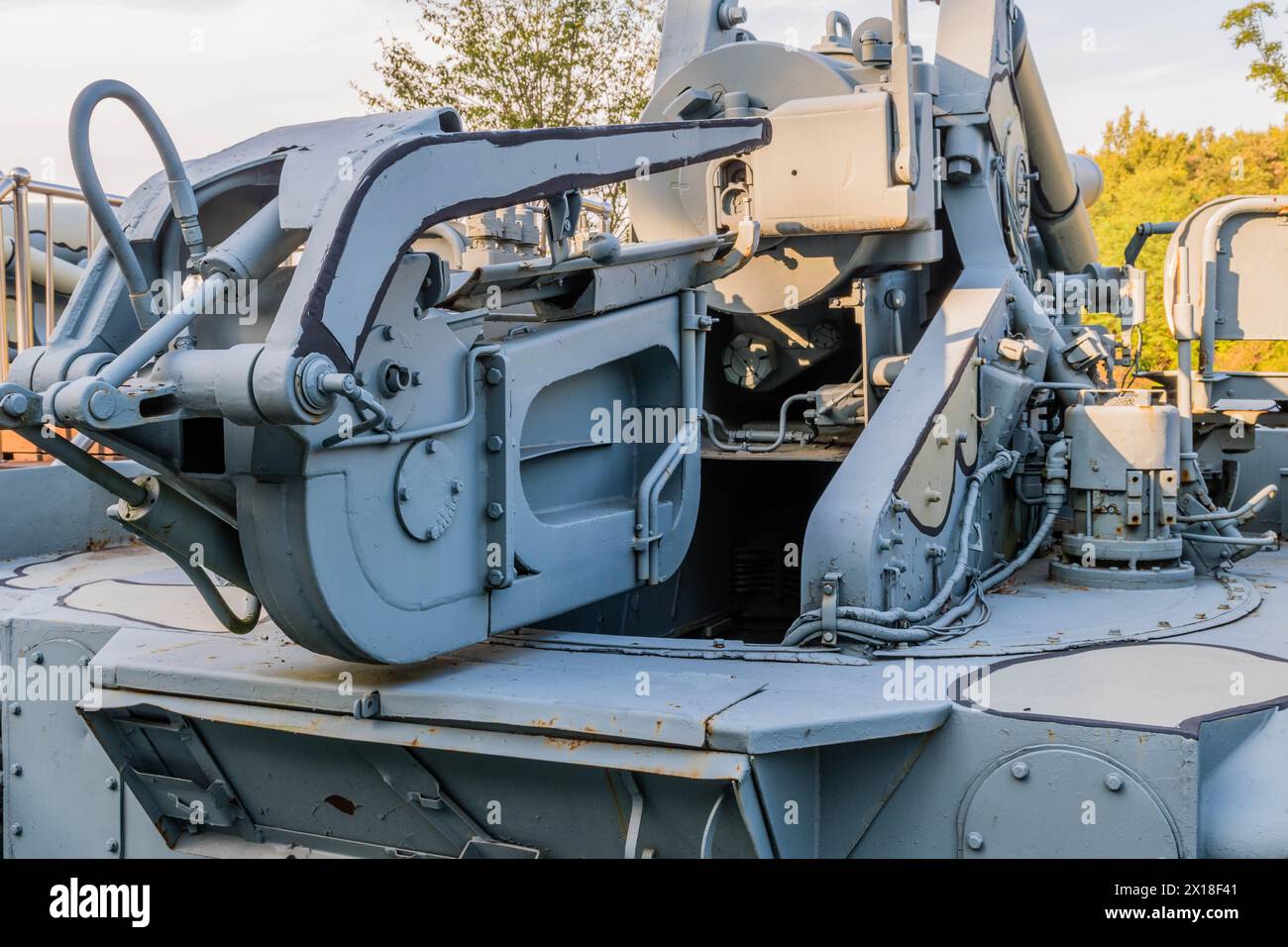 Rear view of camouflaged tank with Closeup view of ammunition loader ...