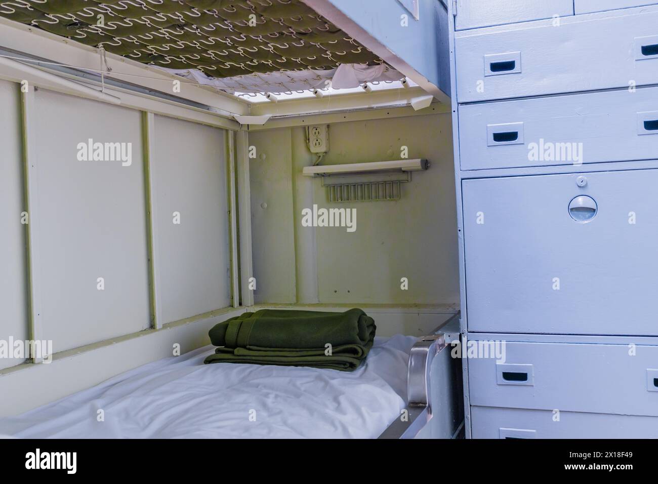 Bunk beds in sailor's cabin on board battleship at Unification Park in ...