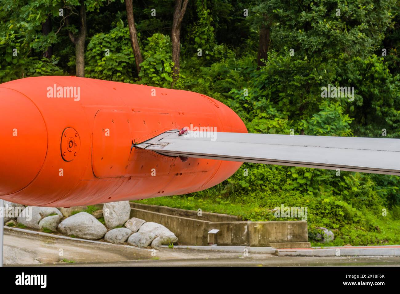 Closeup of wingtip fuel tank on small jet engine trainer on displayat ...
